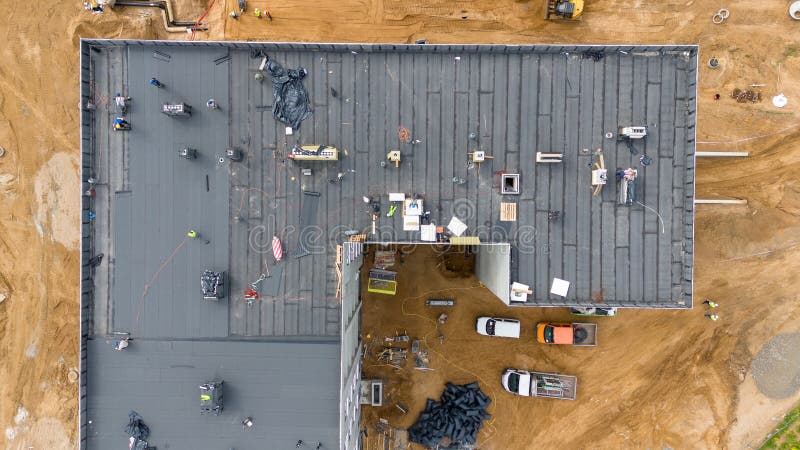 Aerial View of Construction Site with Workers and Vehicles Stock Photo ...