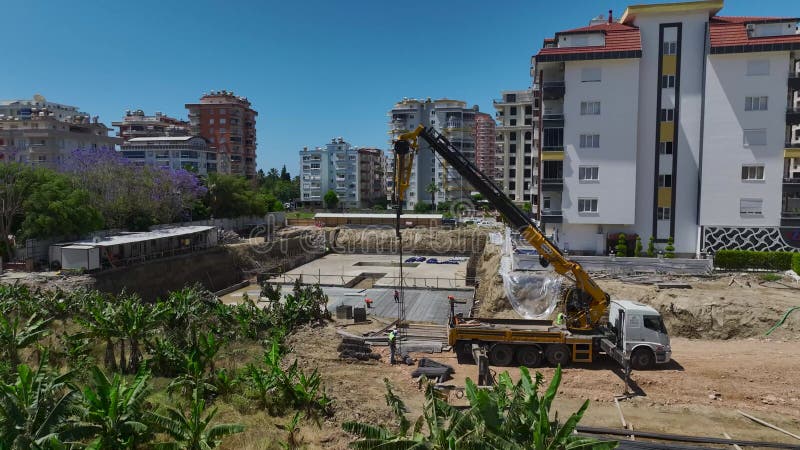 Aerial View: Construction Workers Build a Strong Foundation and ...