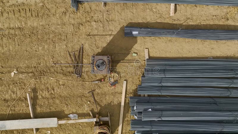 Aerial View: Construction Workers and Engineers Pour Concrete into the ...