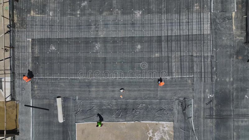 Aerial View: Construction Workers Insulate Walls and Reinforce the ...