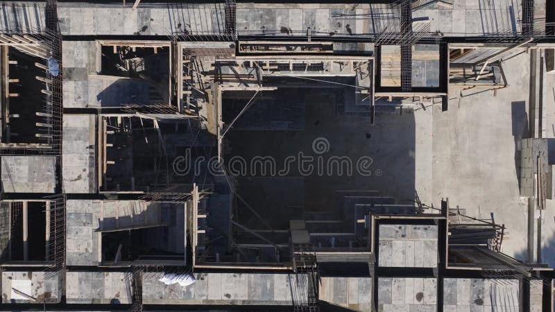 Aerial View: Construction Workers Transport Materials and Assemble ...