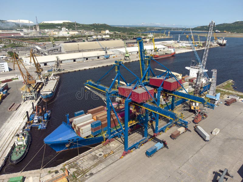 Aerial View of a Container Ship Being Loaded and Unloaded at Container ...