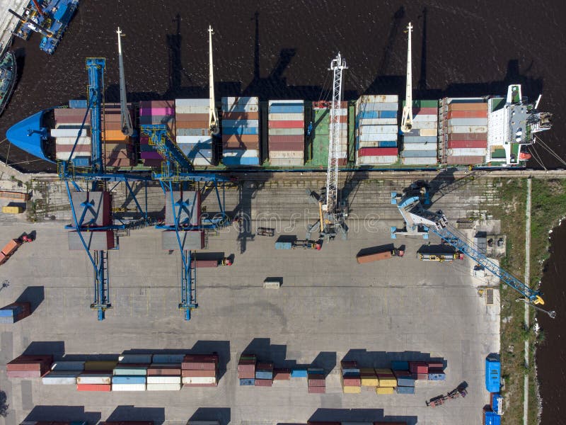 Aerial View of a Container Ship Being Loaded and Unloaded at Container ...