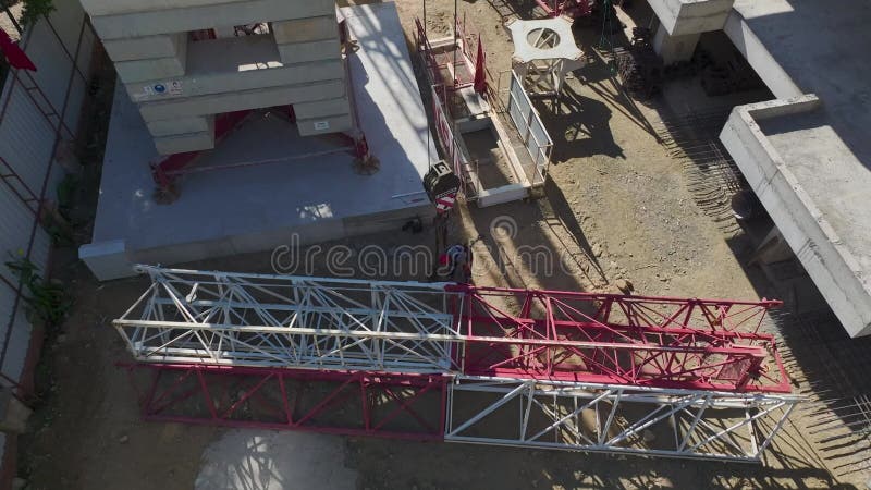 Aerial View: Crane Installation in Progress with Engineers Supervising ...