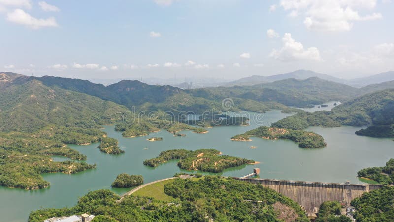 Aerial View of a Dam Surrounded by Green Mountains. Stock Photo - Image ...