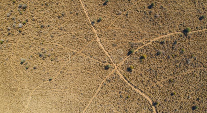 Aerial View of Desert Terrain with Intersecting Paths Stock ...