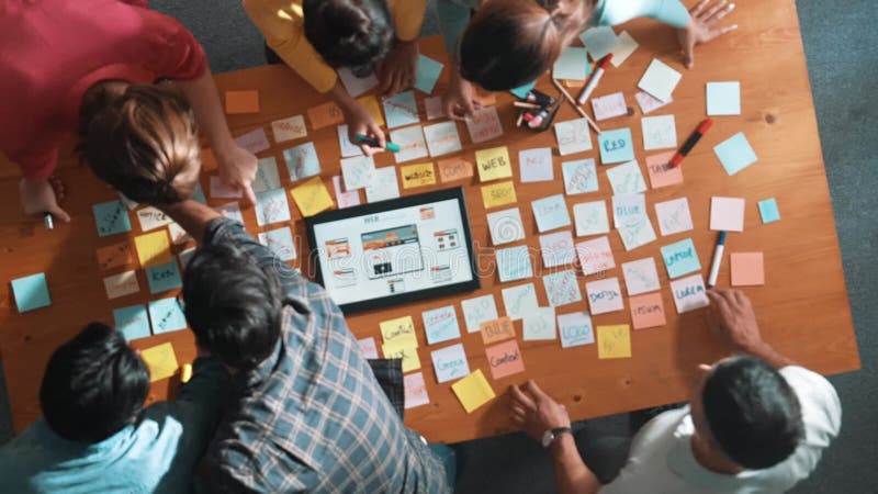 Aerial View of Developer Team Discussing and Show Digital Program ...