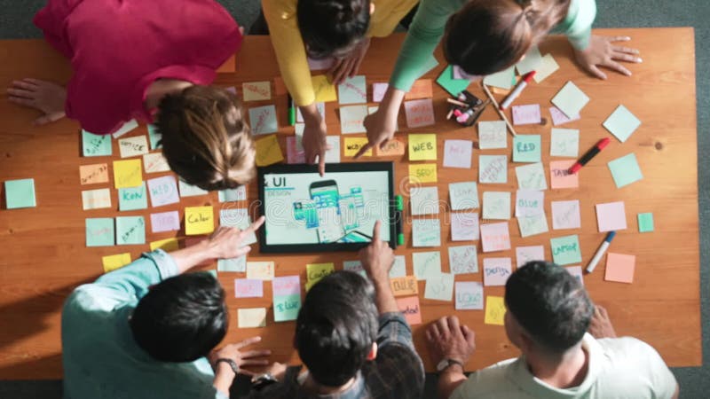 Aerial View of Developer Team Discussing and Show Digital Program ...