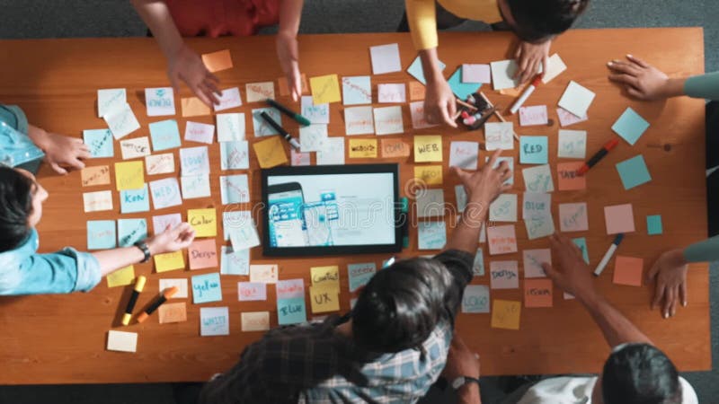 Aerial View of Developer Team Discussing and Show Digital Program ...