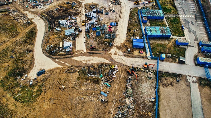 Aerial View of a Developing Area with Construction and Temporary Blue ...