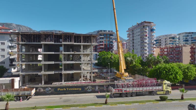 Aerial View: a Dynamic Construction Site with Crane Operators and ...