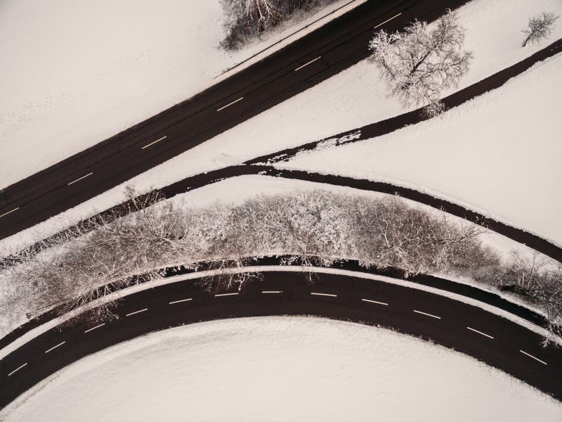 Aerial View of Empty Asphalt Road and Snow-covered Plants Stock Photo ...