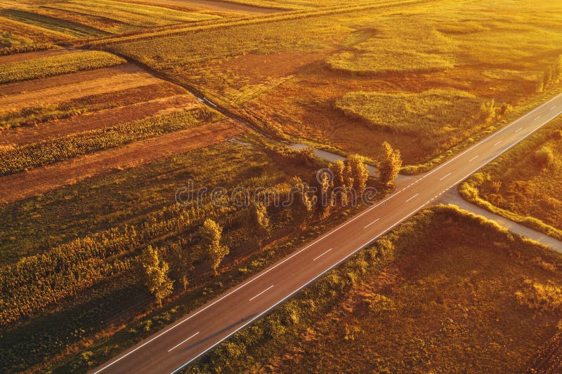 Aerial View of Empty Road through Countryside in Summer Sunset Stock ... Aerial View of Empty Road through Countryside in Summer Sunset Stock ...