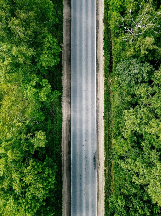Aerial View of Empty Road Going through Green Forest Stock Image ... Aerial View of Empty Road Going through Green Forest Stock Image ...