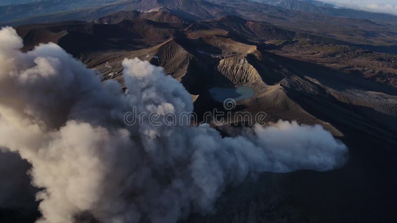 Aerial View of the Eruption of Ash Clouds by Ebeko Volcano. Northern ...