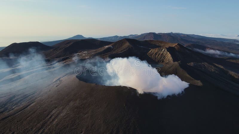 Aerial View of the Eruption of Ash Clouds by Ebeko Volcano. Northern ...