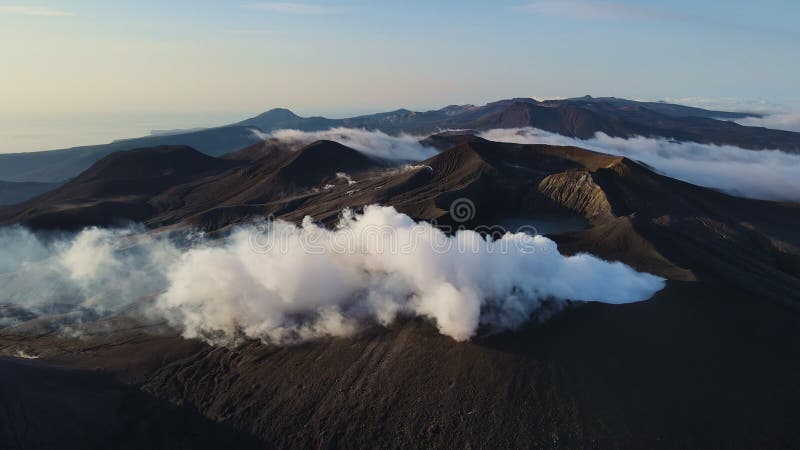 Aerial View of the Eruption of Ash Clouds by Ebeko Volcano. Northern ...