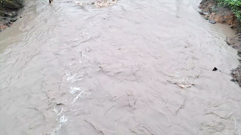 Aerial View of a Fast Flowing River with a Murky Water Texture Stock ...