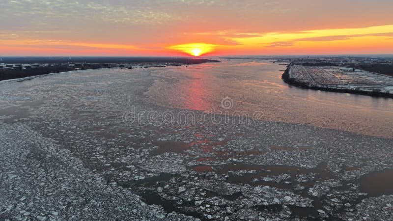 Aerial View of a Fire Sky Sunset Over Frozen Delaware River Stock ...