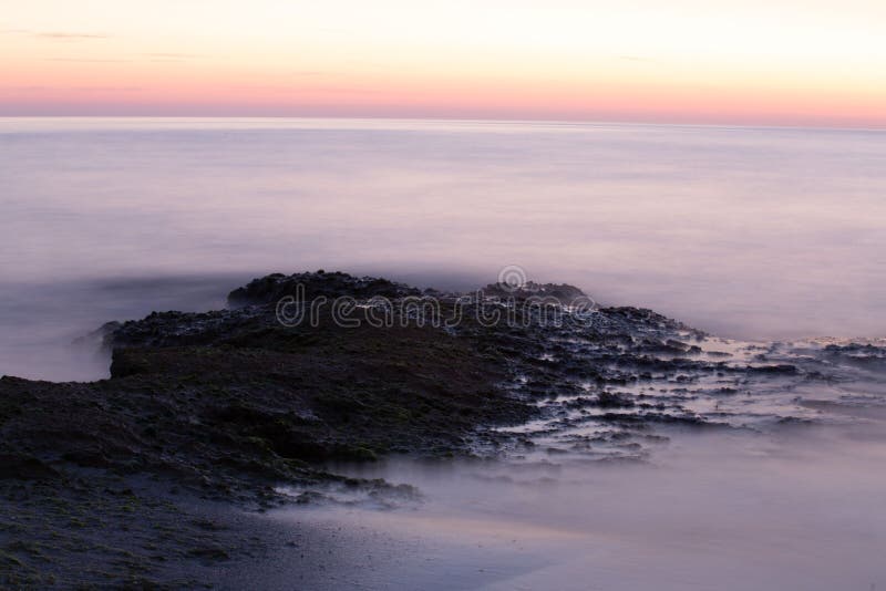 Aerial View of a Floating Layer of Clouds Over Rocky Mountains and ...
