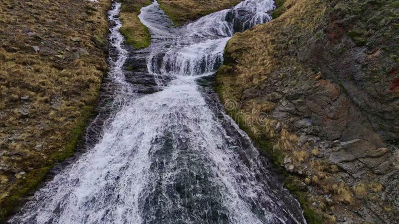 Aerial View of the Flow of Water Falling from the High Cliffs ...