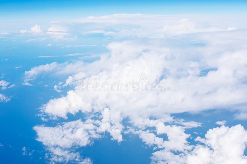 Aerial Perspective of Fluffy Clouds from an Airplane Stock Photo ...
