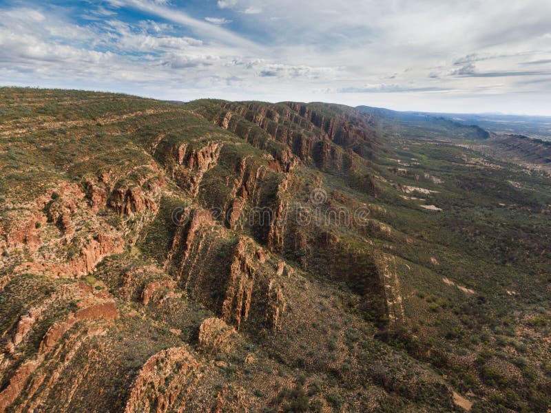 Aerial View of a Forested Cliff Landscape Under a Cloudy Sky Stock ...