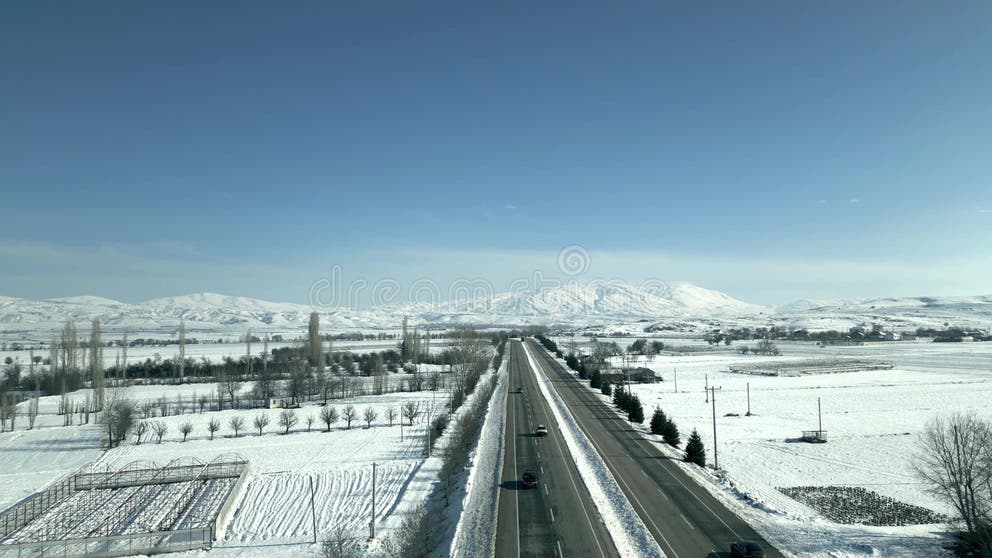 Aerial View of a Freeway and Distant Mountains in Winter Stock Image ...