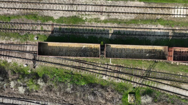 Aerial View of a Freight Train with Empty Containers. Empty Wagons of a ...