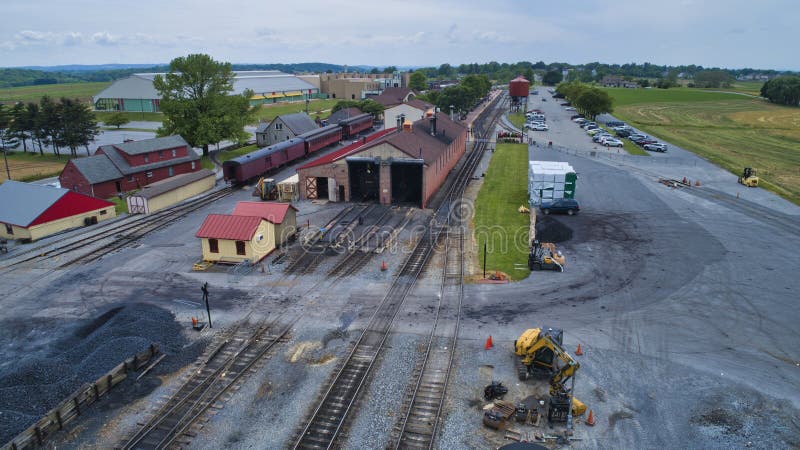 Aerial View of a Freight Yard with an Antique Steam Engine and Freight ...