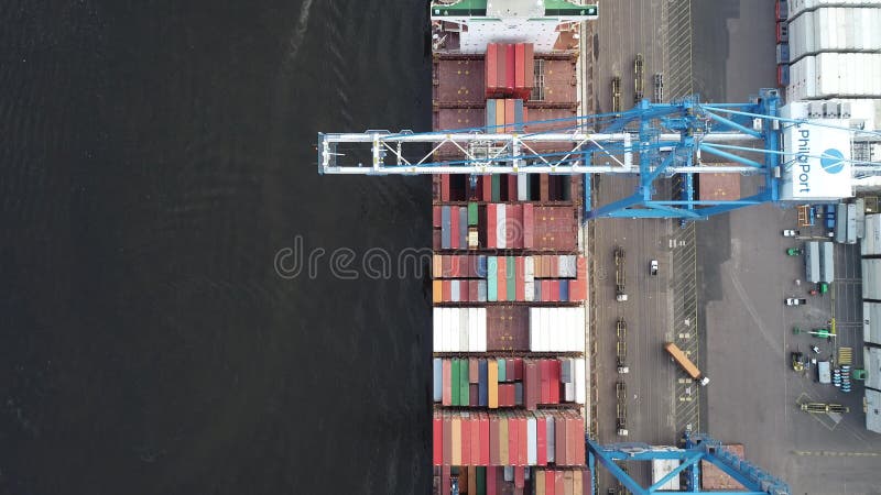 Aerial View of Gantry Crane Loading and Unloading Ship Stock Footage ...