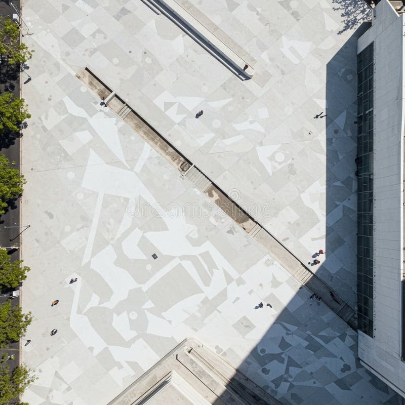 Aerial View of a Geometric Plaza Featuring Abstract Designs in Shades ...