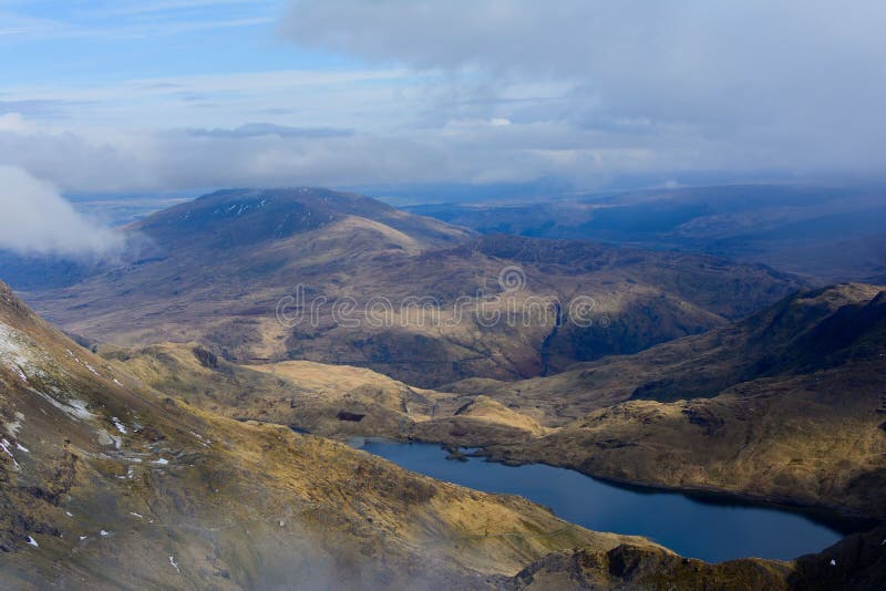 Aerial View of the Green Landscape of Mountains with Clouds in the Sky ...