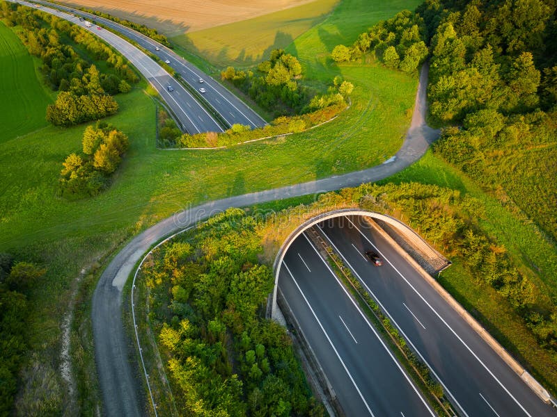 Aerial View of a Green Overpass Over almost Empty Highway Stock Photo ...
