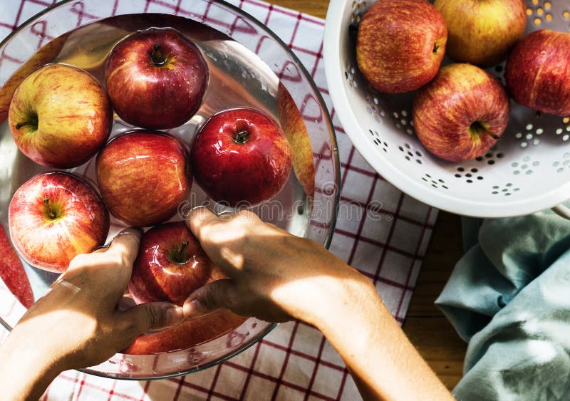 Aerial View of Hands Washing Apples in Bowl Stock Image - Image of ...