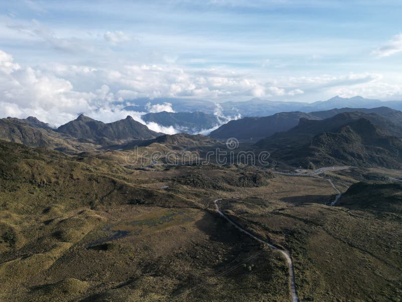 Aerial View of High Mountain Range in the Clouds Stock Photo - Image of ...