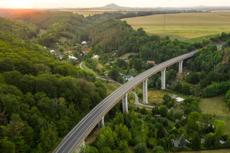 Aerial View of a Highway Bridge with Pillars in the Mountain or Hills ...