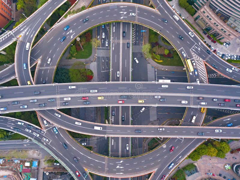 Aerial View of Highway Junctions with Roundabout. Bridge Roads Shape ...