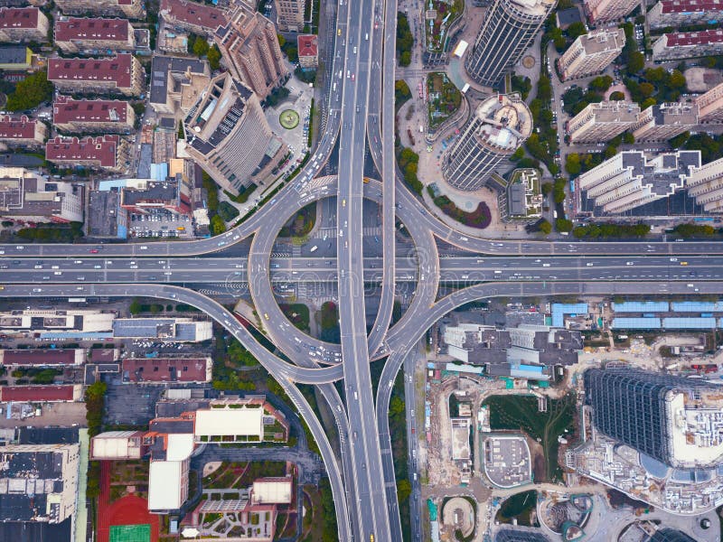 Aerial View of Highway Junctions with Roundabout. Bridge Roads Shape ...
