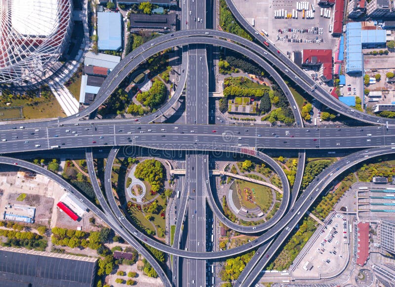 Aerial View of Highway Junctions with Roundabout. Bridge Roads Shape ...