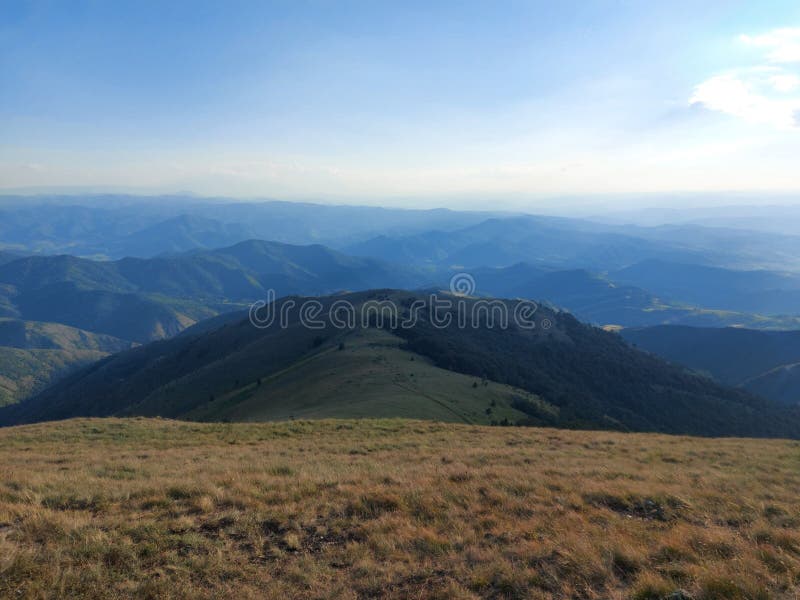 Aerial View of Hills Under a Misty Blue Sky Stock Image - Image of mist ...