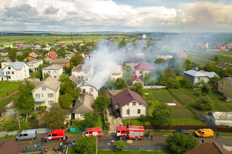 Aerial View of a House on Fire with Orange Flames and White Thick Smoke ...