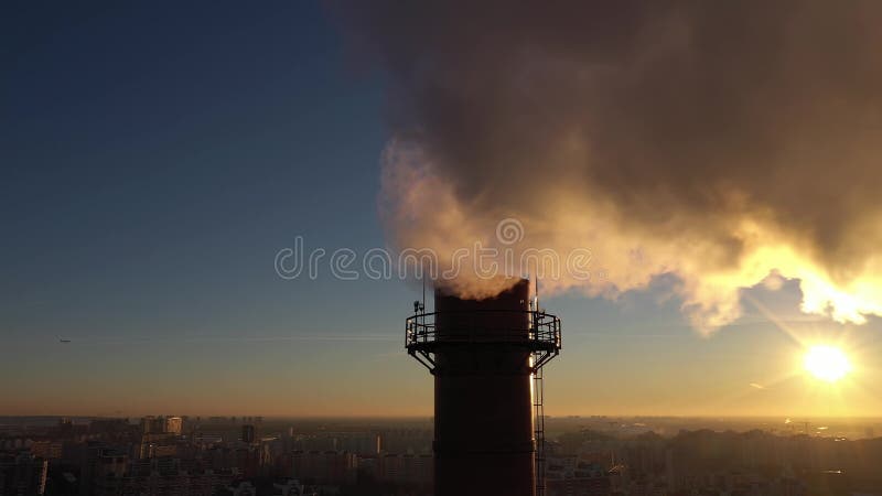 Aerial View of Industrial Smoke Stack and Flying Airliner Stock Photo ...