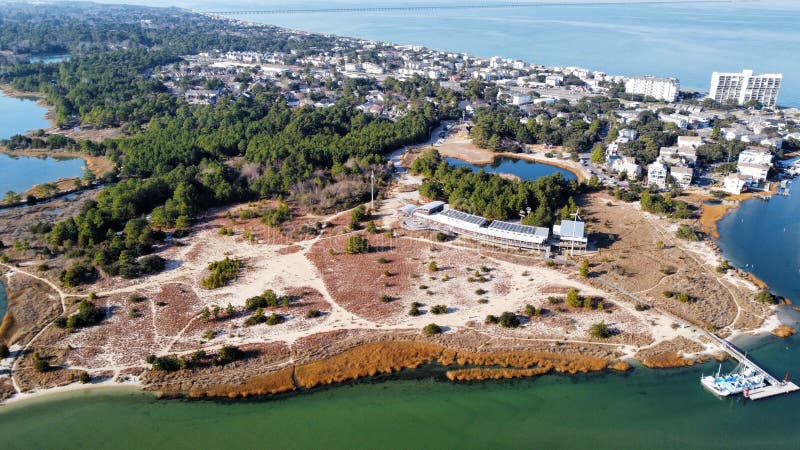 Aerial View of an Island Full of Buildings and Trees at Sunlight Stock ...