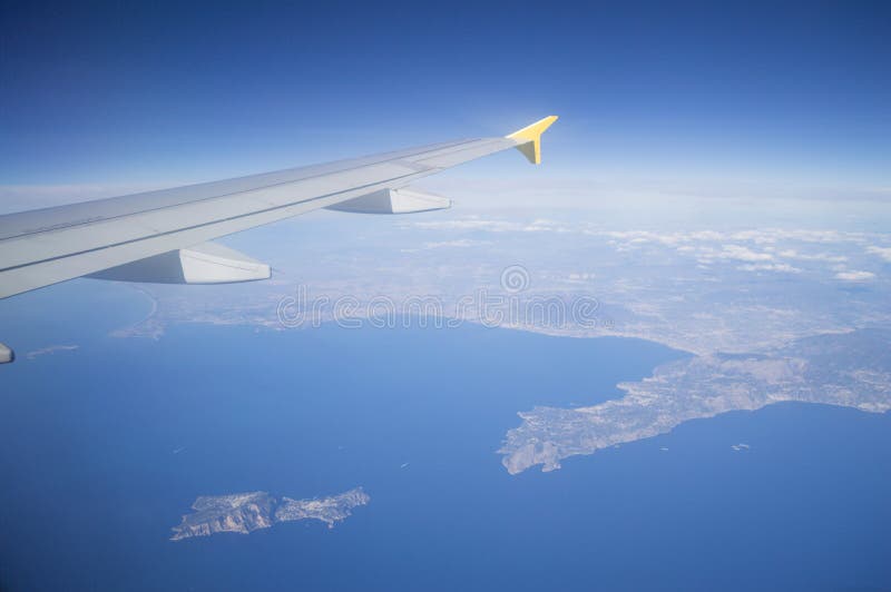 Aerial View of Italian Coastline with Wing of Plane in Flight Stock ...