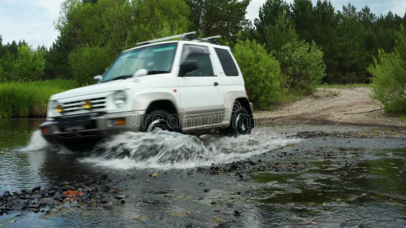 Aerial View of a Jeep Driving Across the River Stock Video - Video of ...