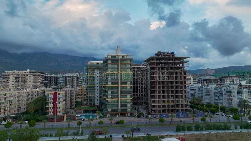 Aerial View 4K: Construction Site on Seaside, Building Progress by the ...