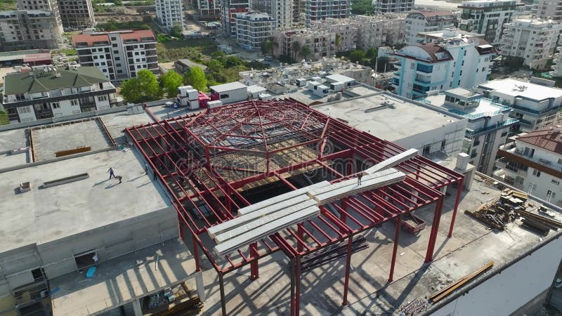 Aerial View 4K: High-Rise Work - Lifting Steel Structures for Rooftop ...
