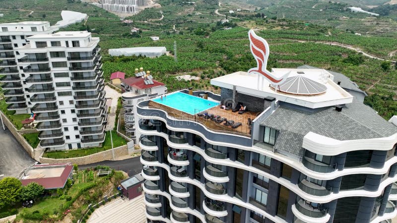 Aerial View 4K: Modern Abode with Infinity Pool, Skyline Serenity Stock ...