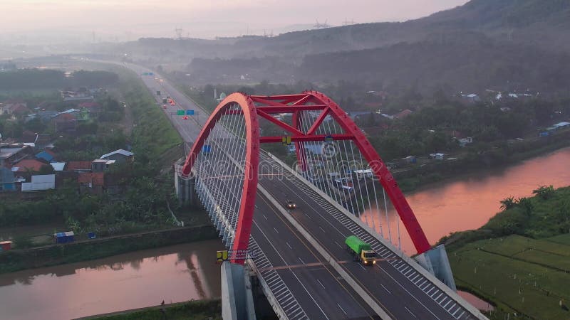 Aerial View of the Kalikuto Bridge, an Iconic Red Bridge at Trans Java ...